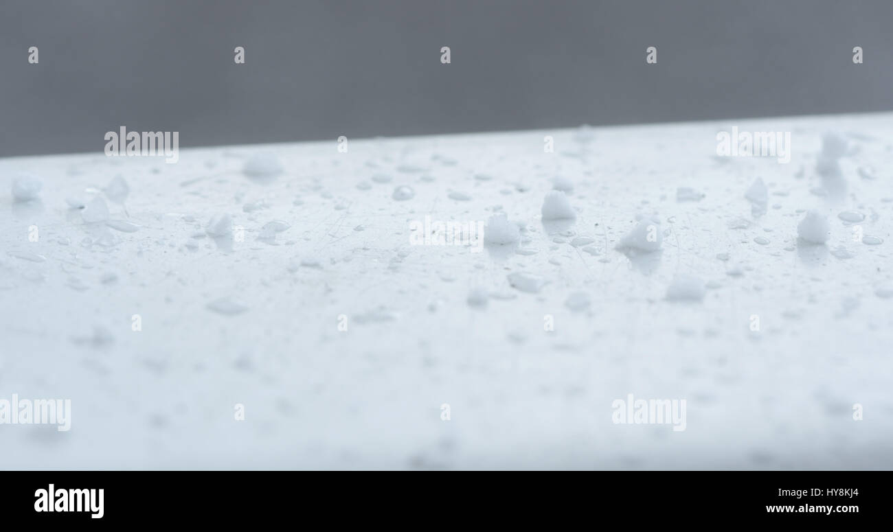 hailstones falling and bouncing on window slope, 4k photo Stock Photo ...