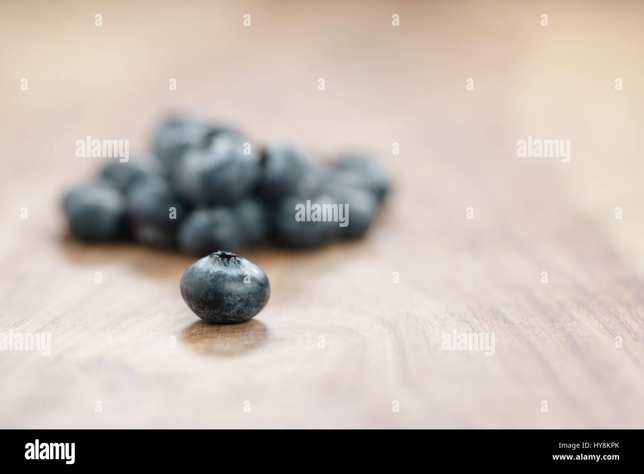 fresh garden blueberries on wood table, closeup photo Stock Photo - Alamy