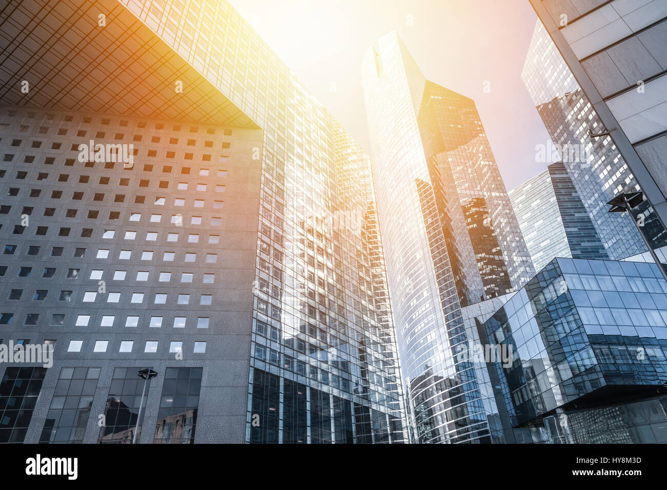 Modern skyscrapers at sunset with sunlight Stock Photo - Alamy