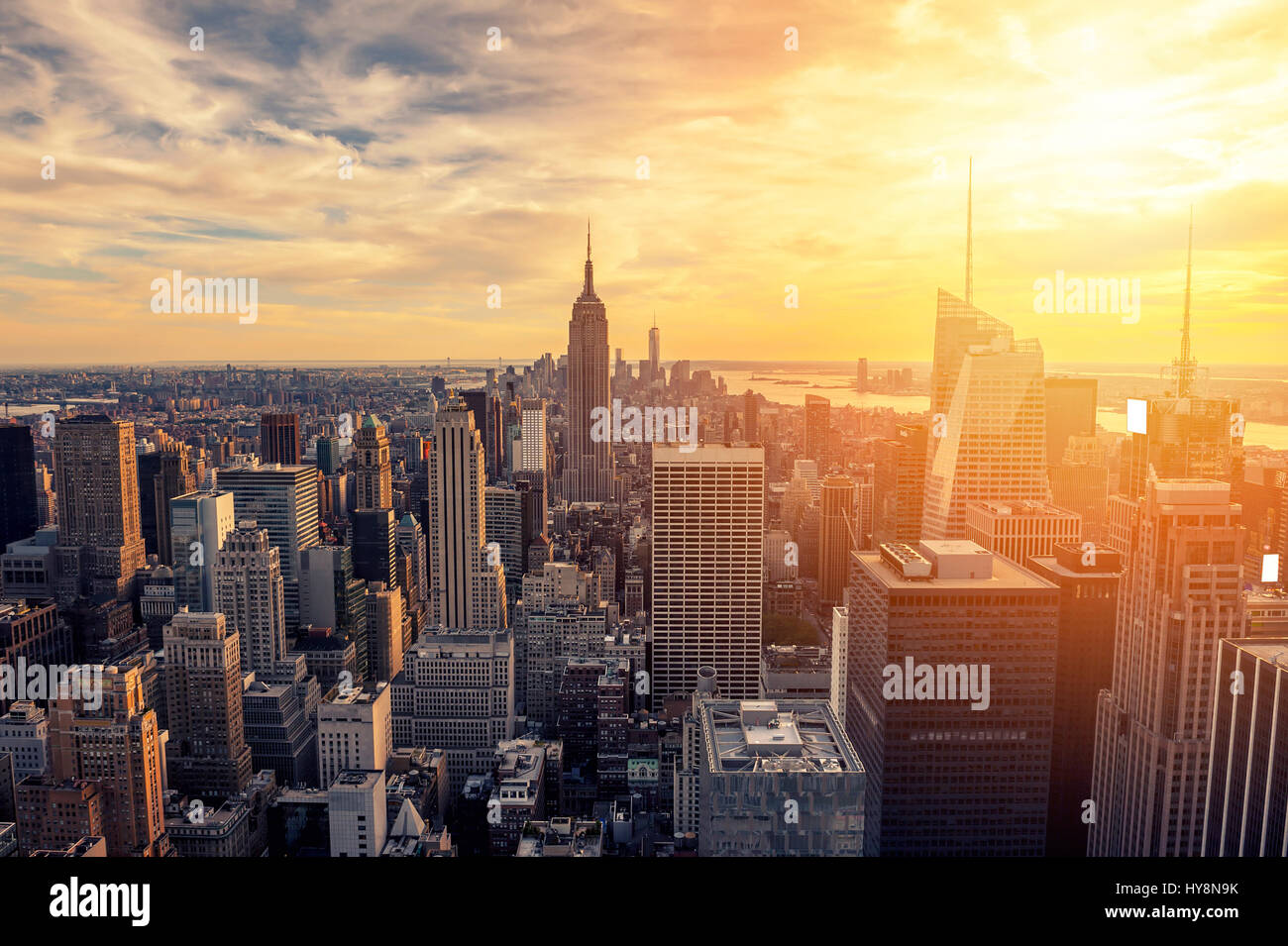 New York City skyline with urban skyscrapers at sunset Stock Photo - Alamy