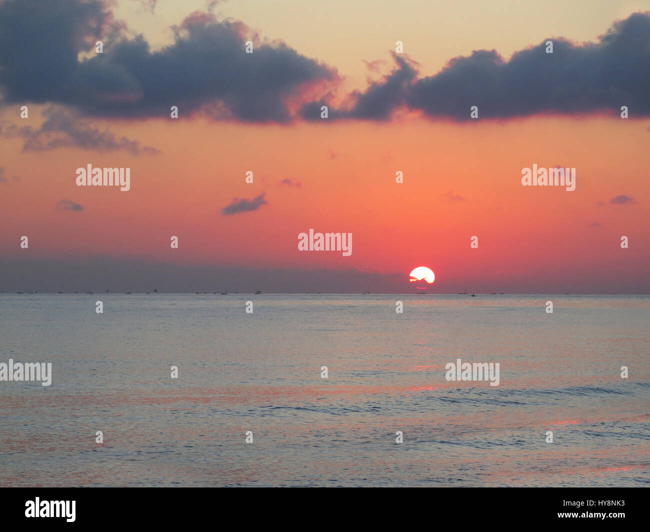 sunset in ocean Bali Stock Photo - Alamy