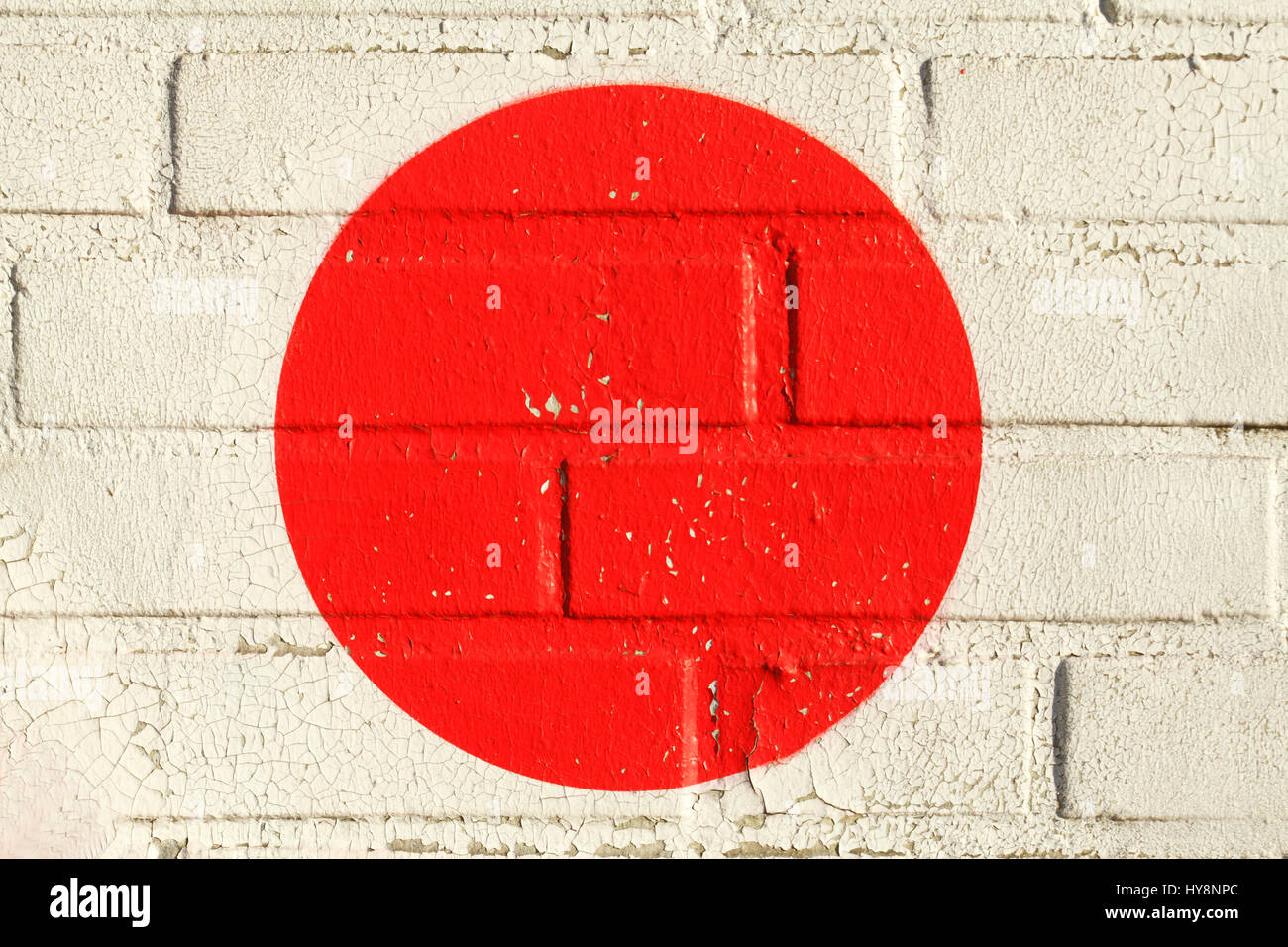 white painted brick wall, red circle Stock Photo - Alamy
