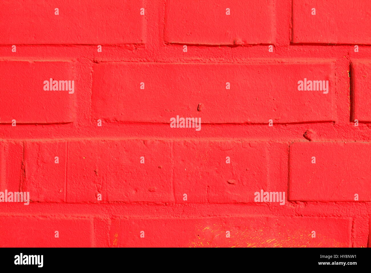 red painted brick wall Stock Photo - Alamy