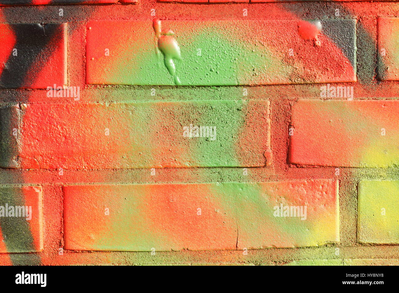 colorful painted brick wall Stock Photo - Alamy