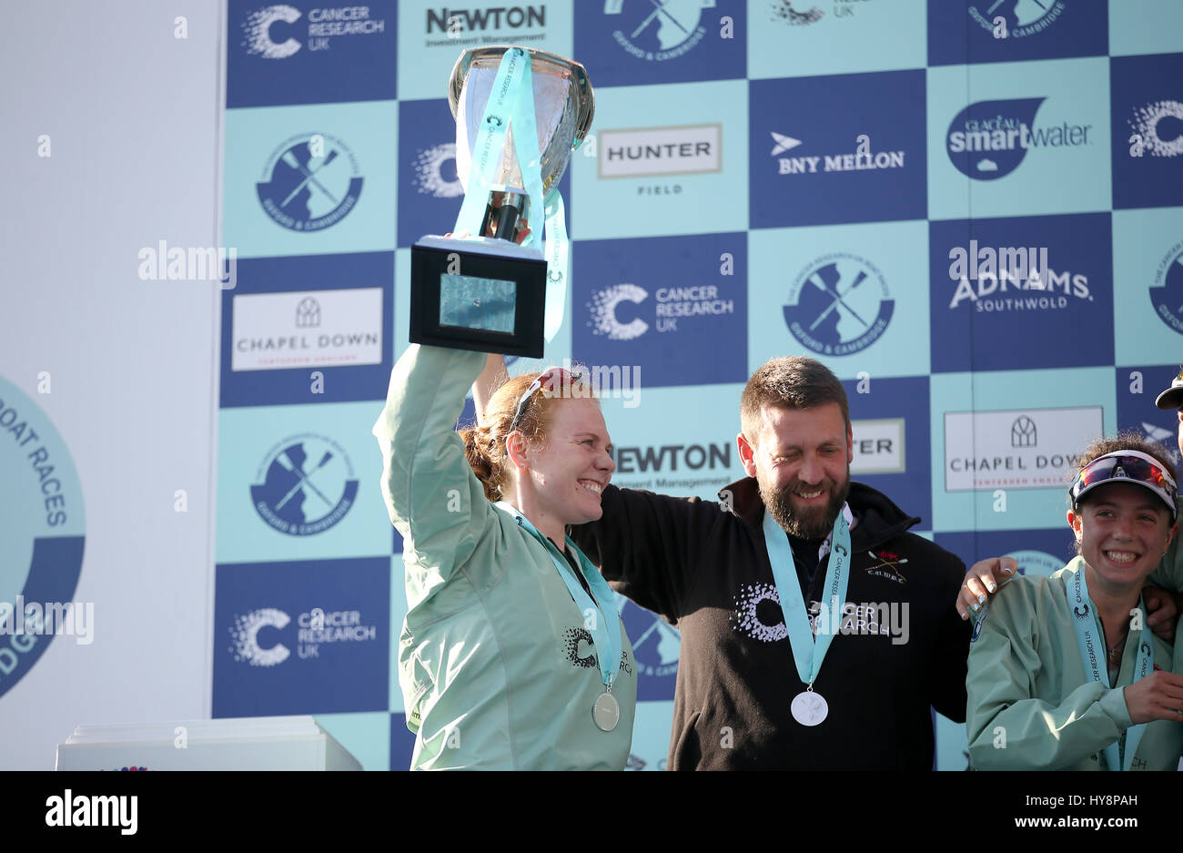 Cambridge Women's Ashton Brown (left) and Coach Rob Baker celebrate ...