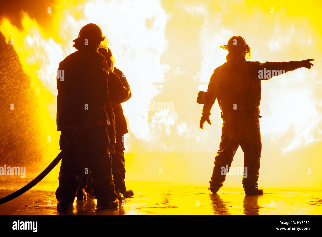 Fire chief pointing to the right during firefighting exercise Stock ...