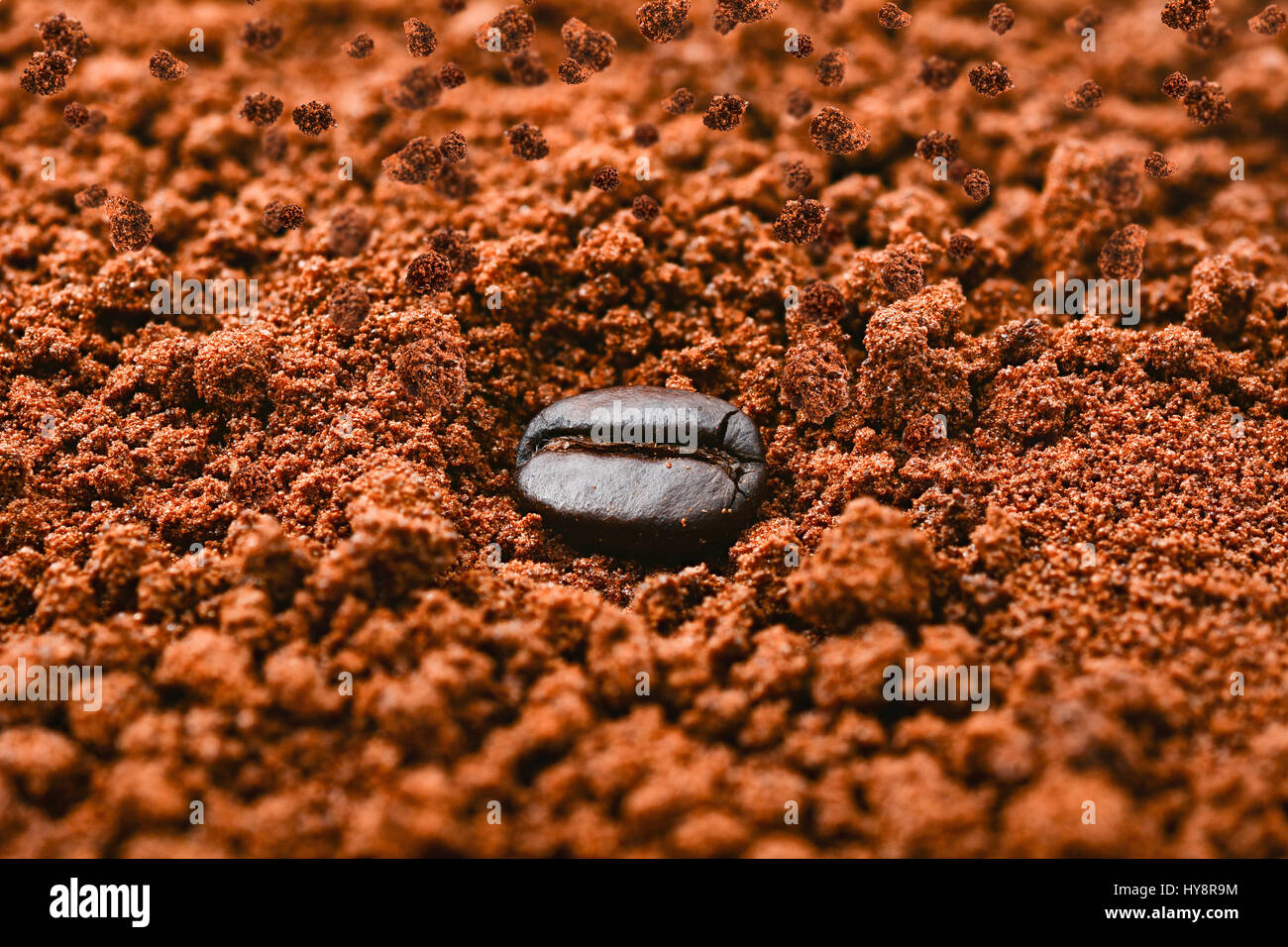 Close-up for coffee bean with dropping instant coffee Stock Photo - Alamy