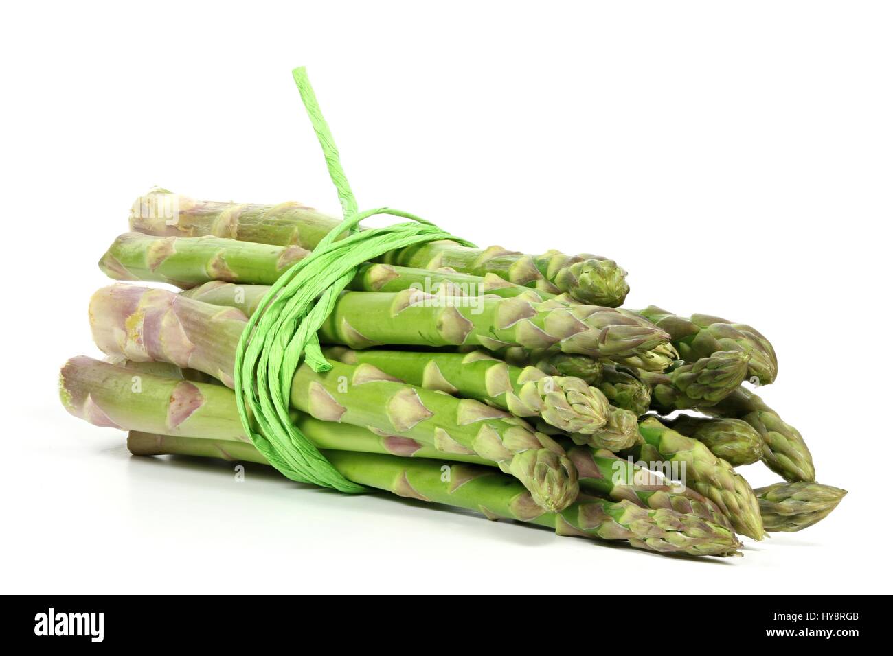 bundle of green asparagus isolated on white background Stock Photo - Alamy
