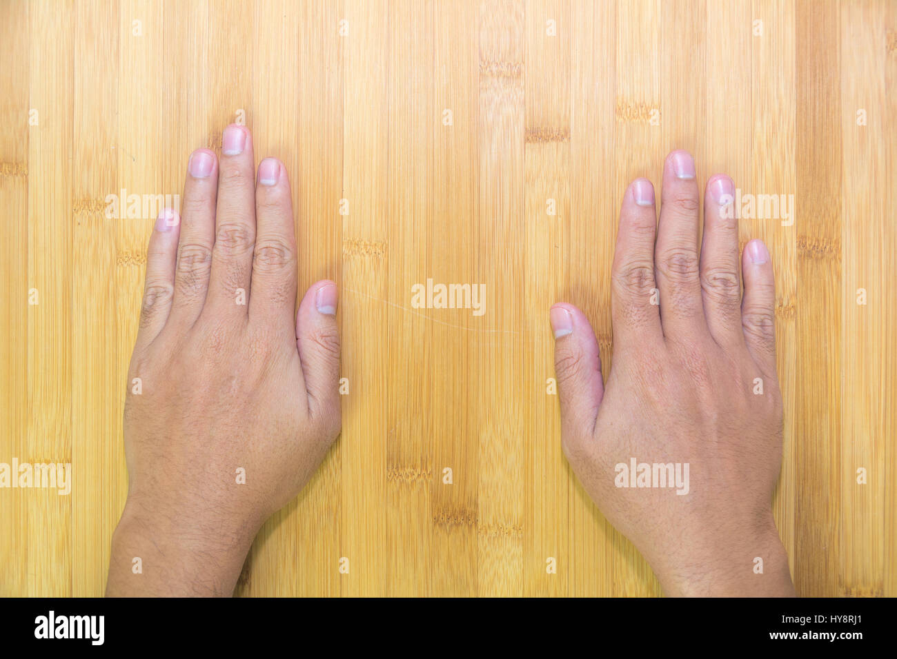 Top view for back hand on table Stock Photo - Alamy