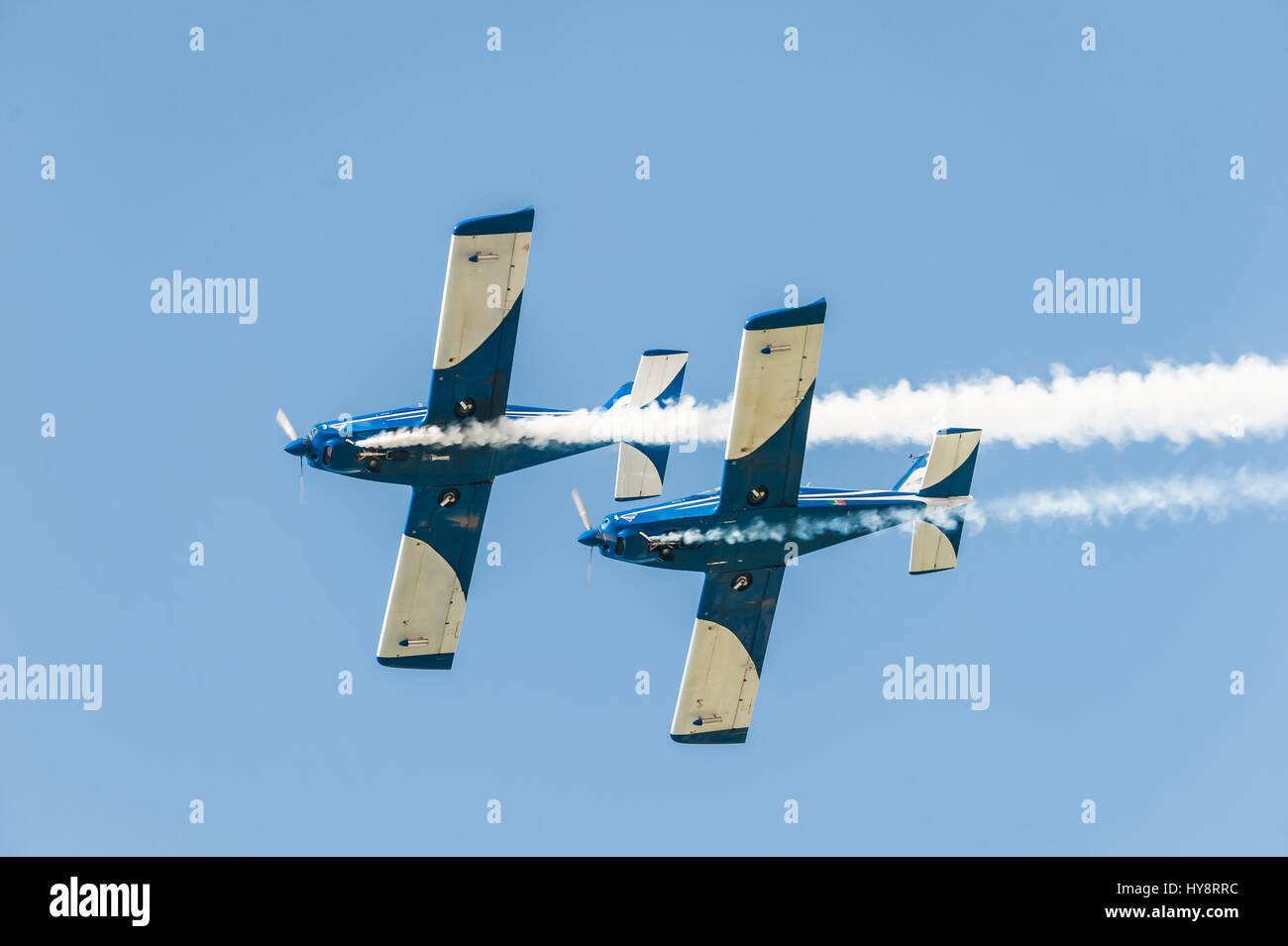 Two airplanes on airshow in formation Stock Photo - Alamy