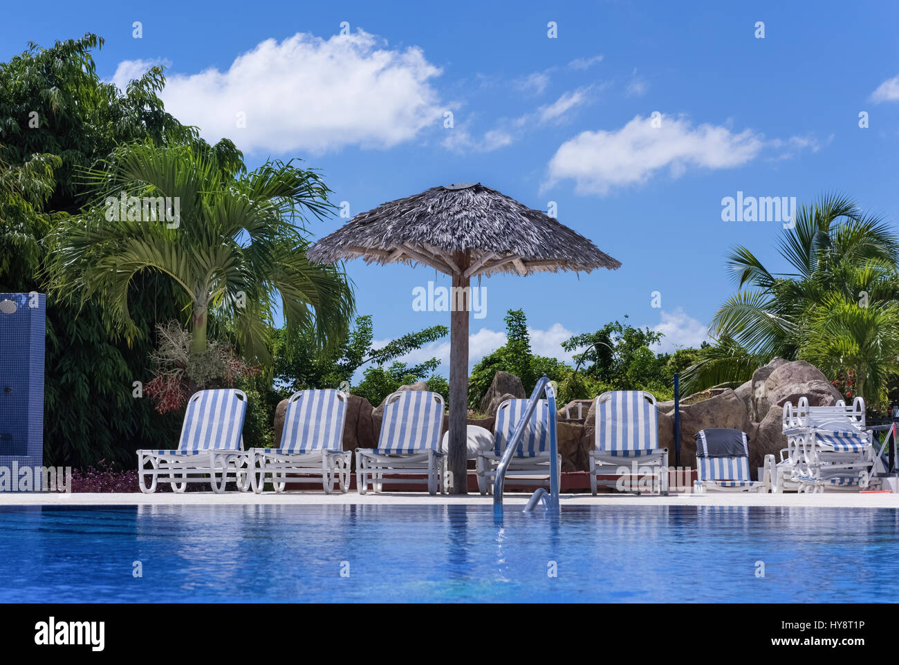 Swimming pool view with sun lounger - Serie Cuba Reportage Stock Photo ...