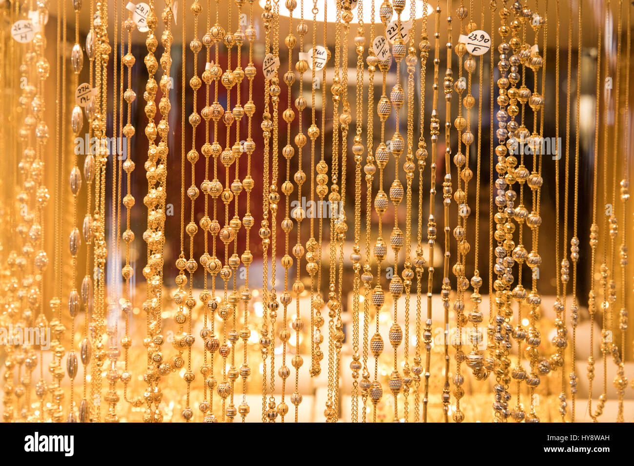 Gold jewelry on window display in Dubai gold souk Stock Photo - Alamy