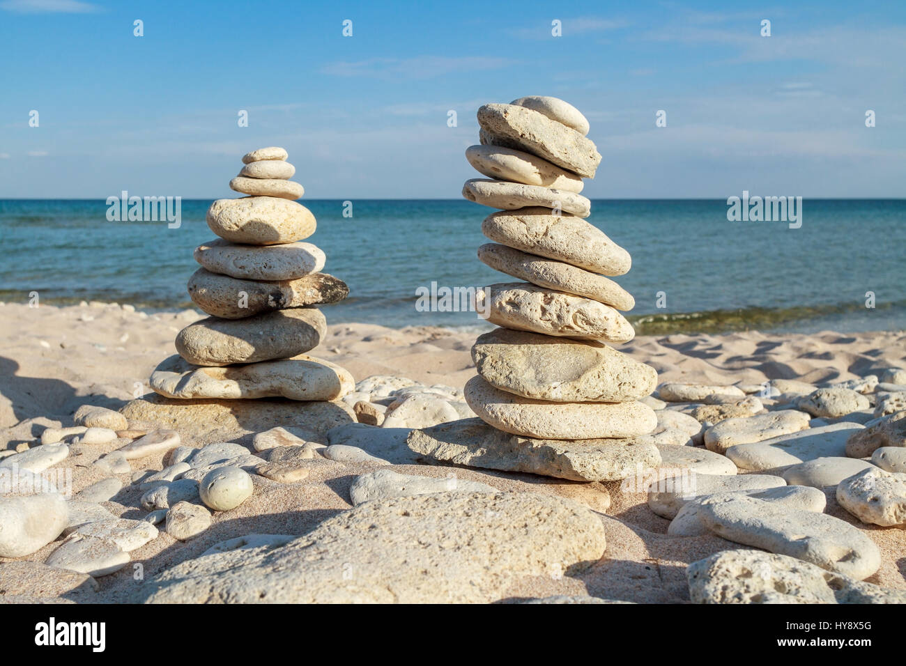 stone piles on the beach Stock Photo - Alamy