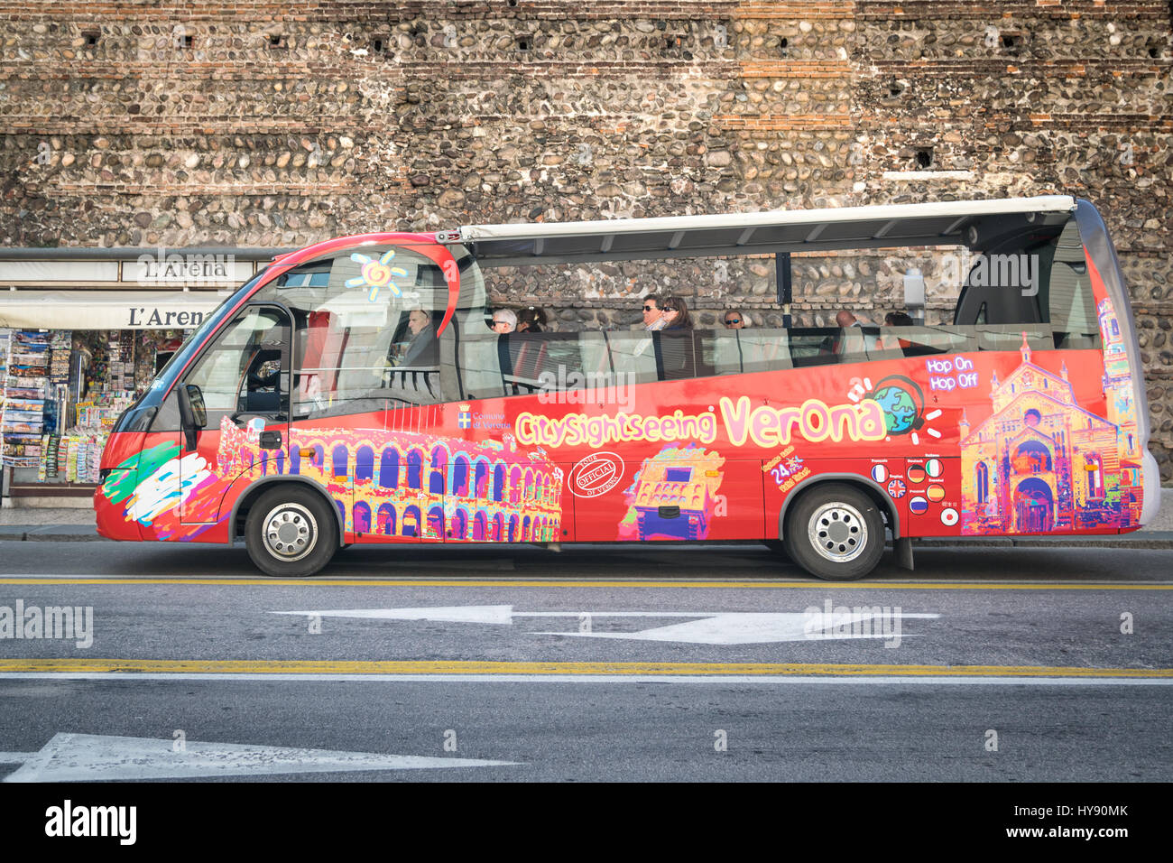 Verona, Italy - March 20, 2016: Typical open bus on the sides used to ...