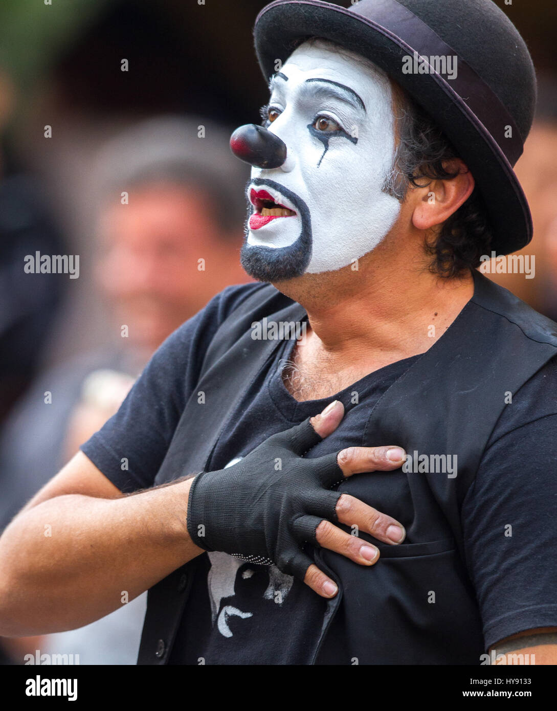 A mime artist do their act on the street, out side Teatro Juarez in ...