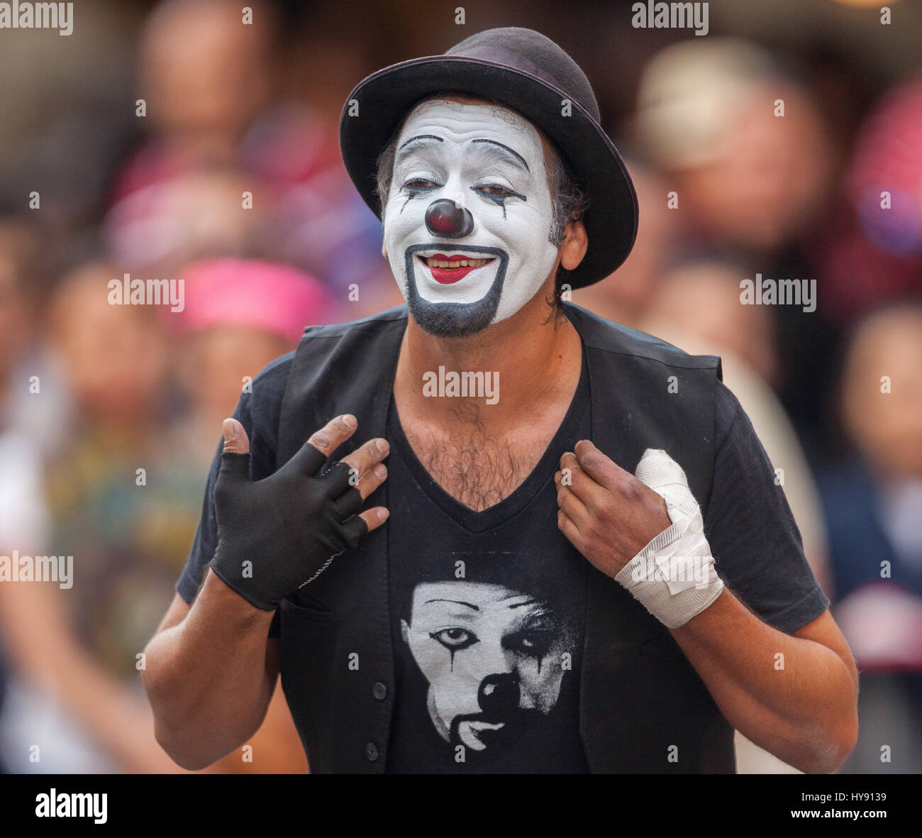 A mime artist do their act on the street, out side Teatro Juarez in ...