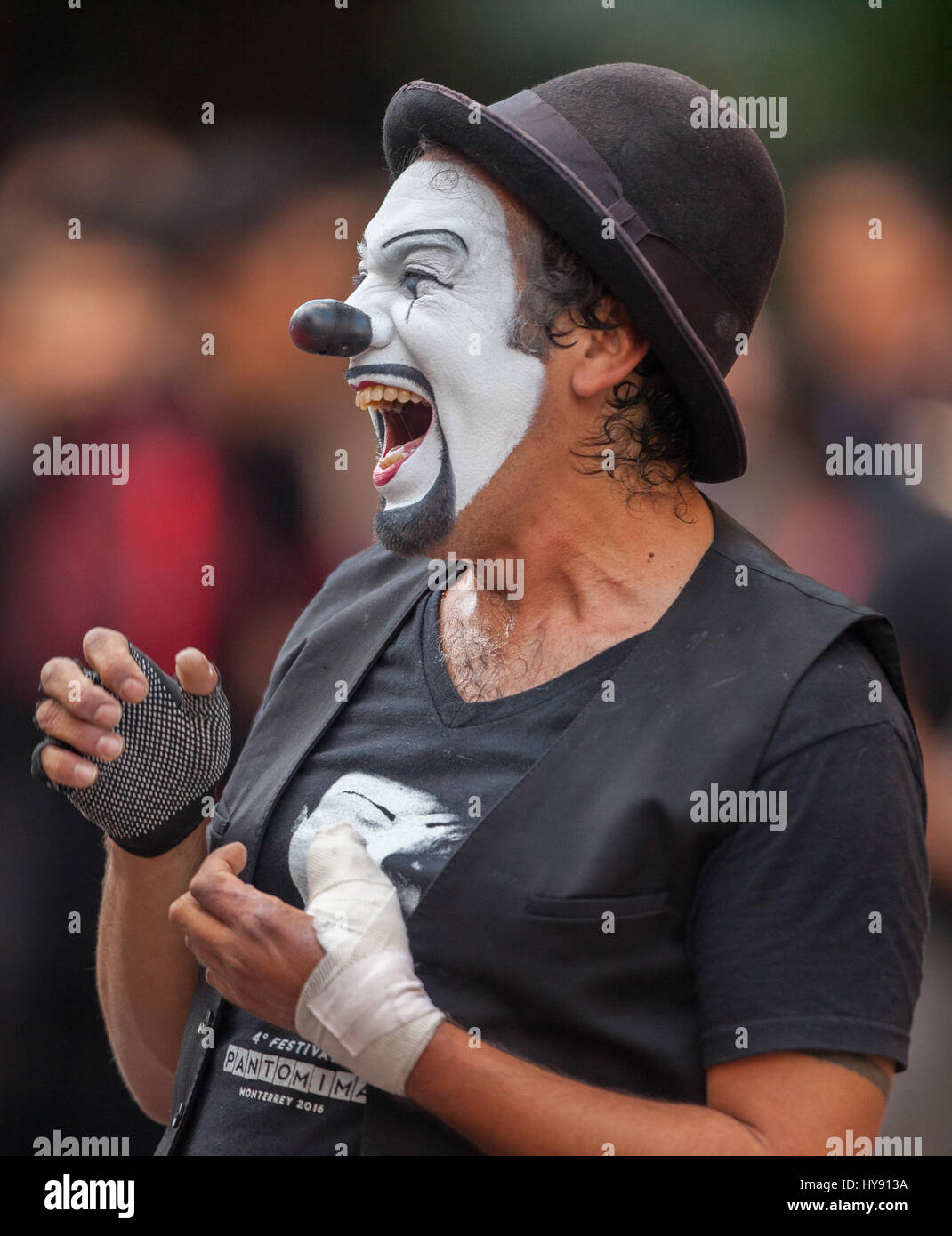 A mime artist do their act on the street, out side Teatro Juarez in ...