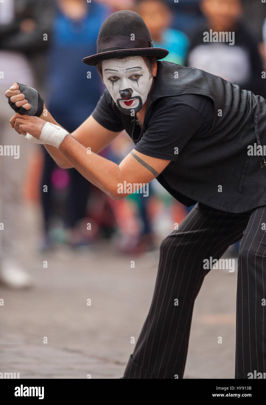 A mime artist do their act on the street, out side Teatro Juarez in ...