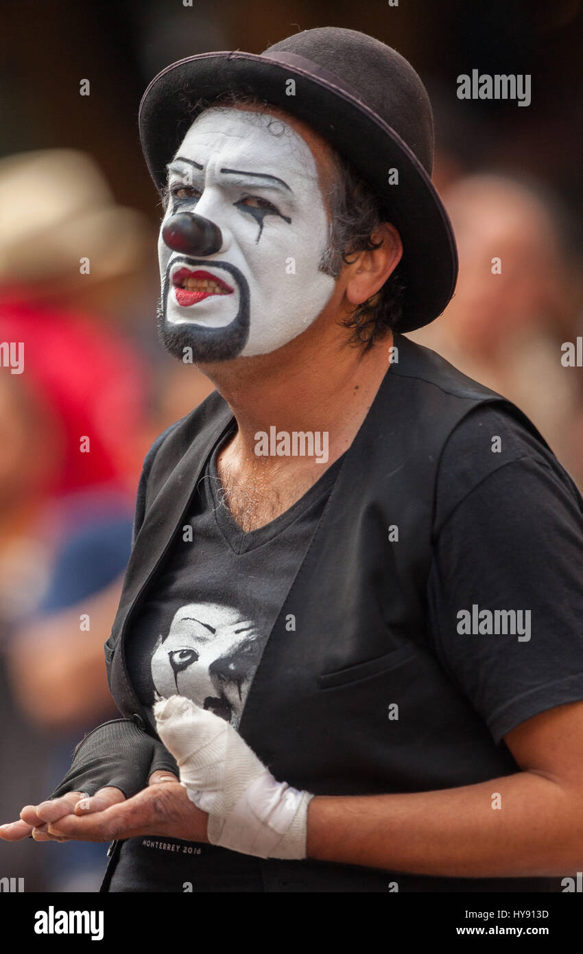 A mime artist do their act on the street, out side Teatro Juarez in ...
