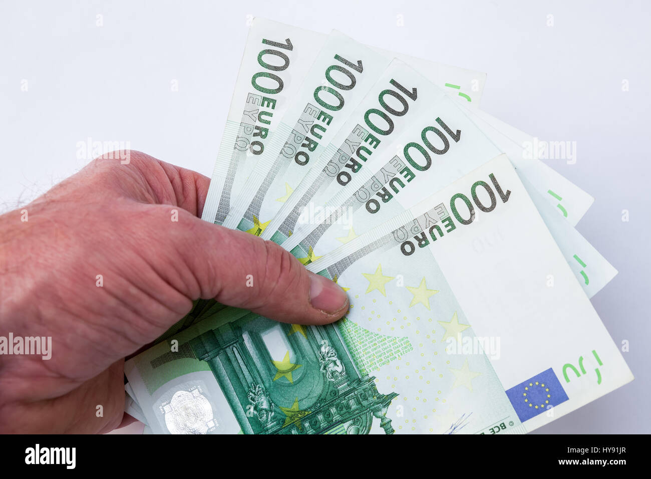 various notes of euro in the hand with a white background Stock Photo ...