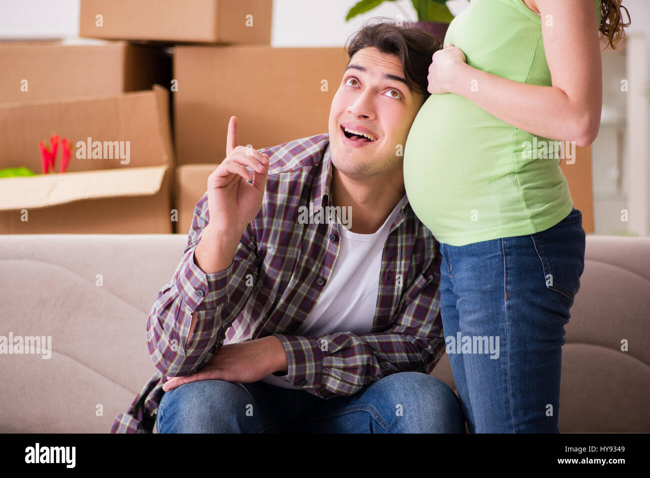 Young couple of man and pregnant wife expecting baby Stock Photo - Alamy
