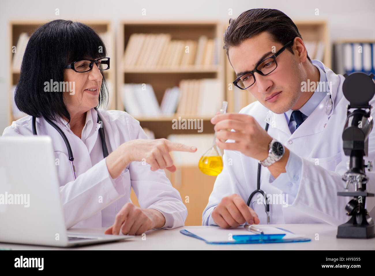 Two doctors working in the lab Stock Photo - Alamy