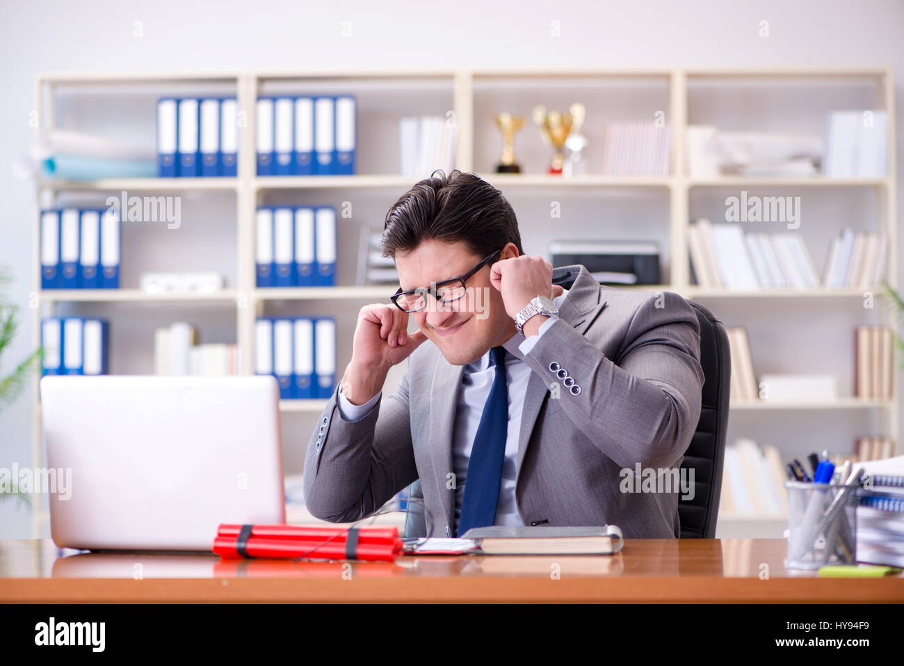 Angry aggressive businessman in the office Stock Photo - Alamy