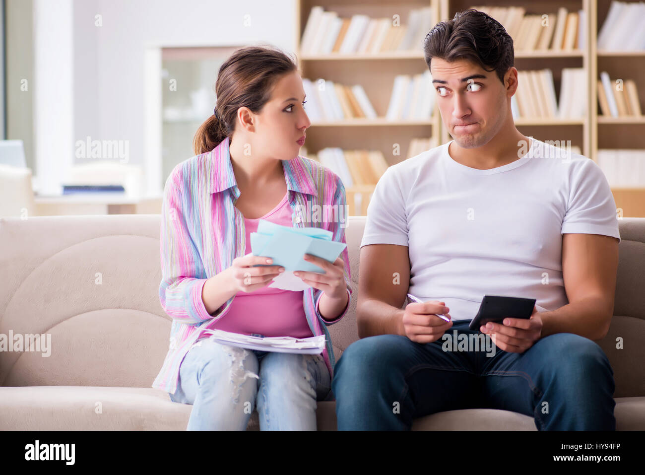 Young family discussing family finances Stock Photo - Alamy