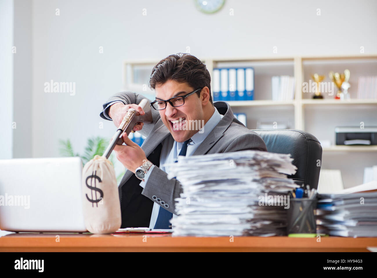 Angry aggressive businessman in the office Stock Photo - Alamy