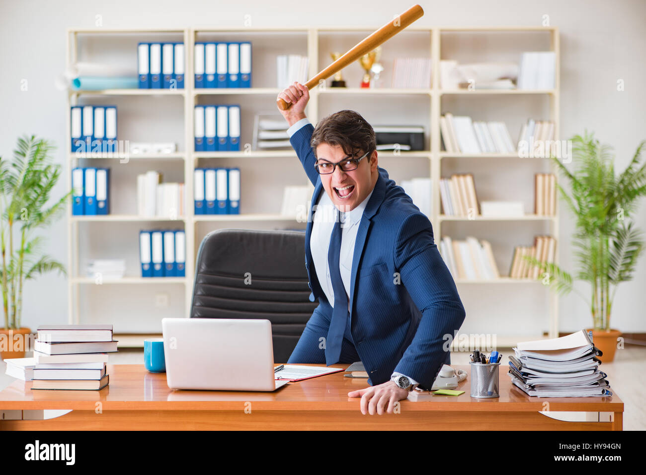 Angry aggressive businessman in the office Stock Photo - Alamy