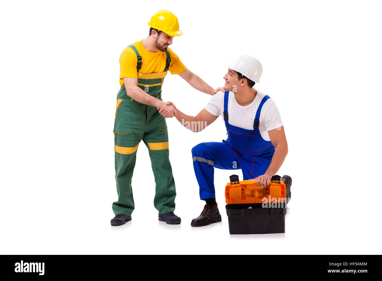 Two workers isolated on the white background Stock Photo - Alamy