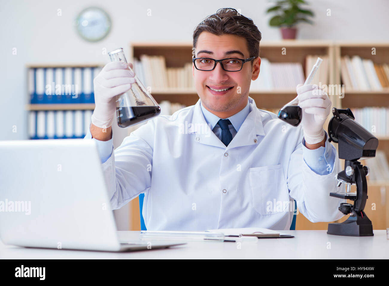 Chemical engineer working on oil samples in lab Stock Photo - Alamy