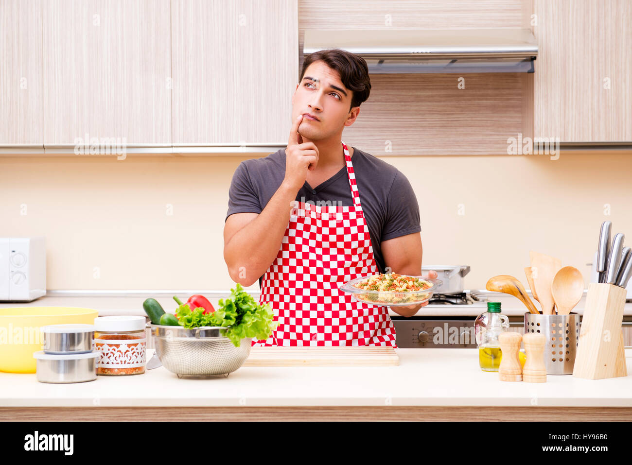 Man male cook preparing food in kitchen Stock Photo - Alamy