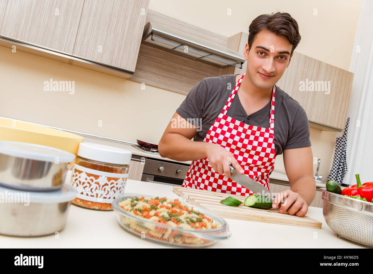 Man male cook preparing food in kitchen Stock Photo - Alamy
