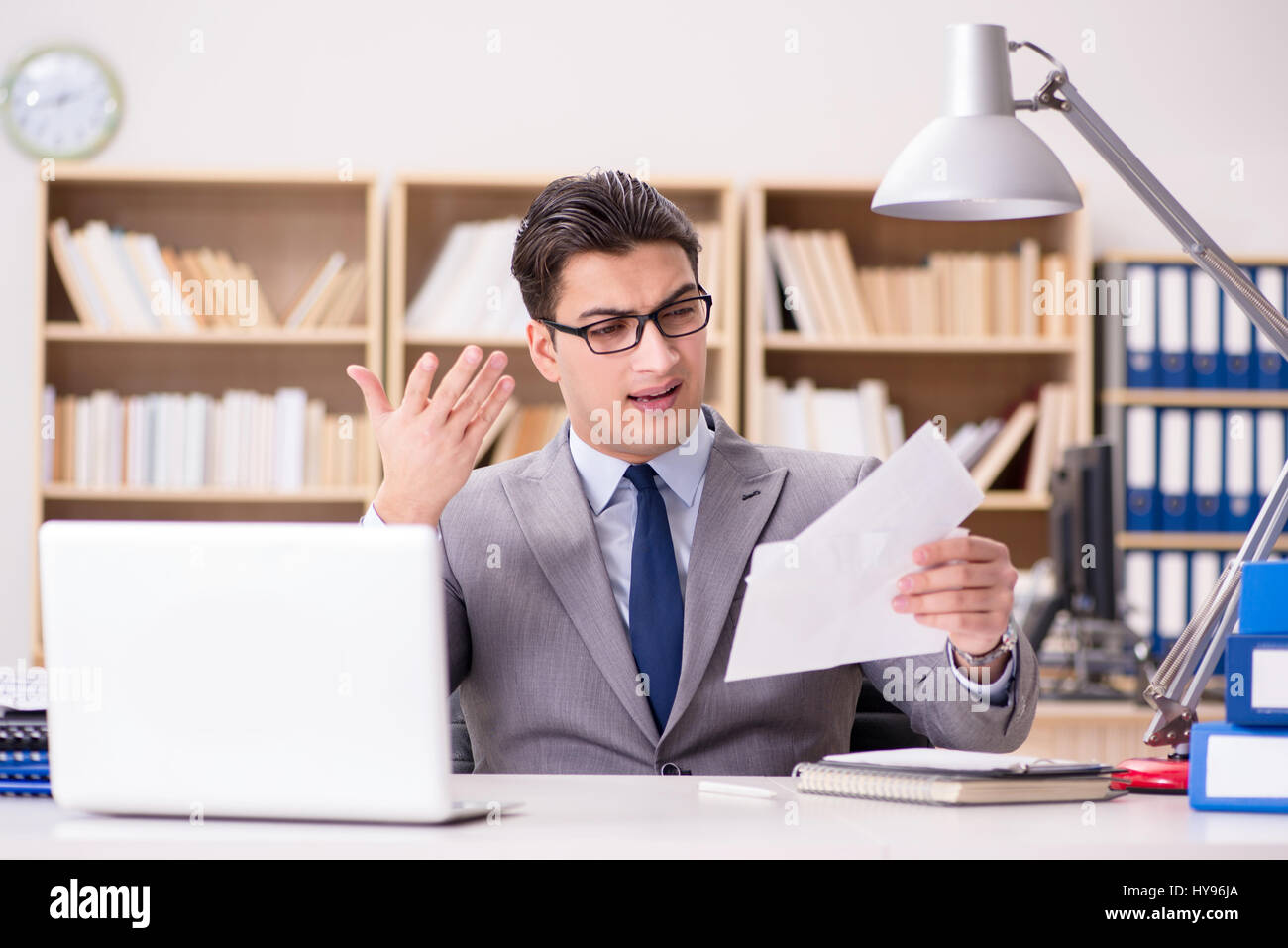 Businessman receiving letter in the office Stock Photo - Alamy