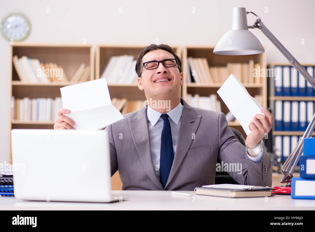 Businessman receiving letter in the office Stock Photo - Alamy