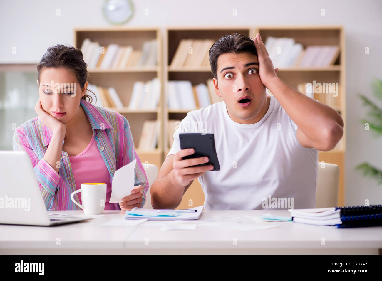 Couple finances happy receipt hi-res stock photography and images - Alamy