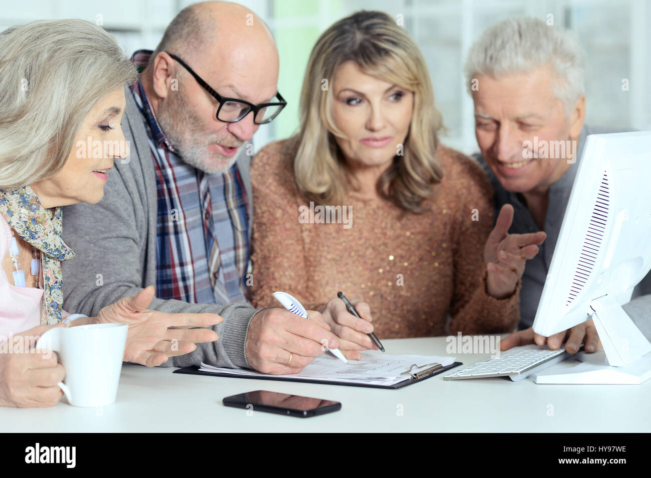Team of businessmen working together Stock Photo - Alamy