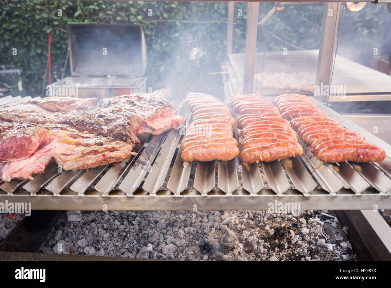 Cooking assorted meat at barbecue outdoor,Shallow depth of field Stock ...