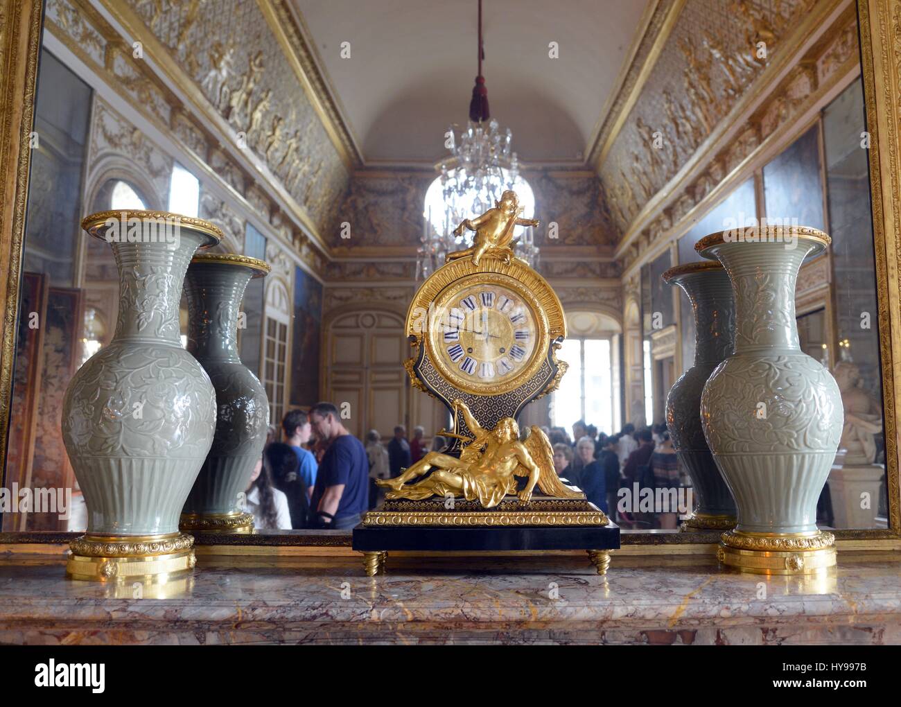 A golden clock in the palace of Versailles on June twentyfirst 2016 ...