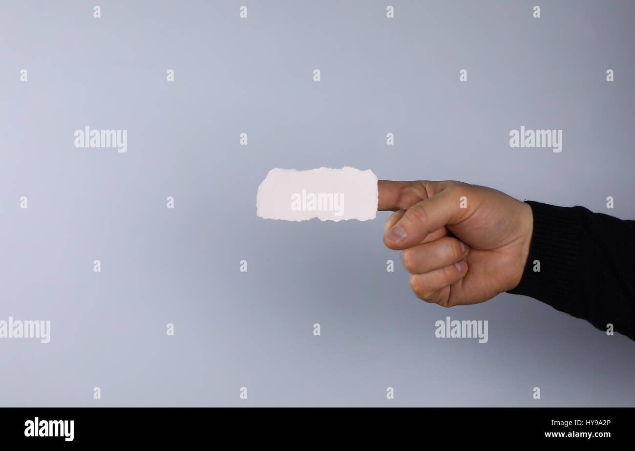 small white piece of paper in his hand man Stock Photo - Alamy