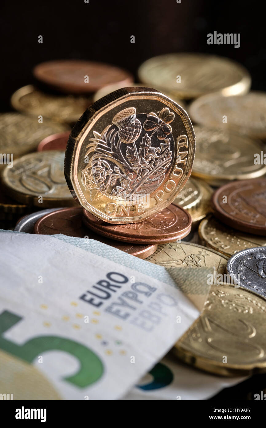 New Pound Coin with Euro currency Stock Photo - Alamy