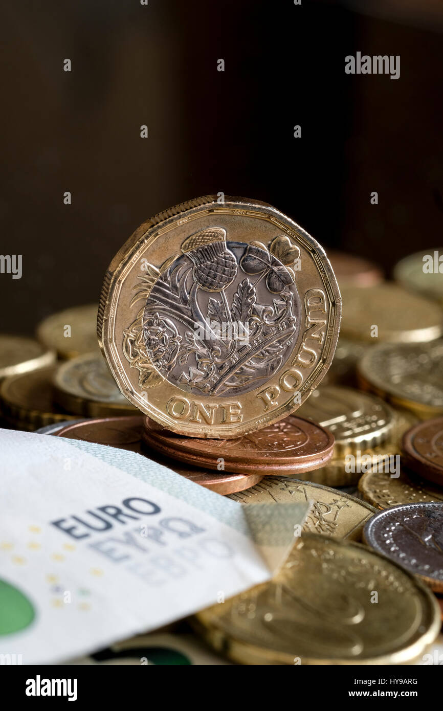 New Pound Coin with Euro currency Stock Photo - Alamy
