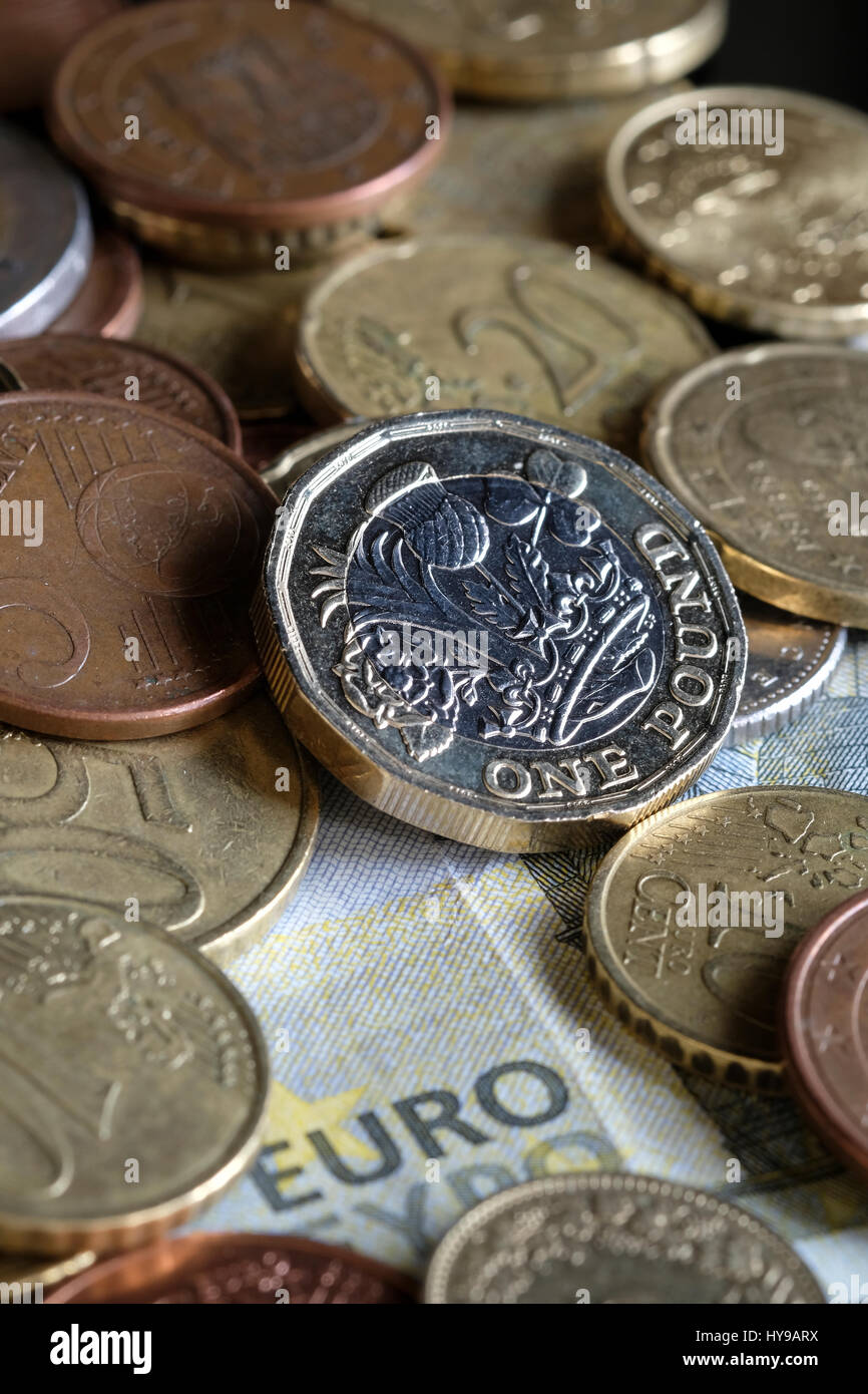 New Pound Coin with Euro currency Stock Photo - Alamy