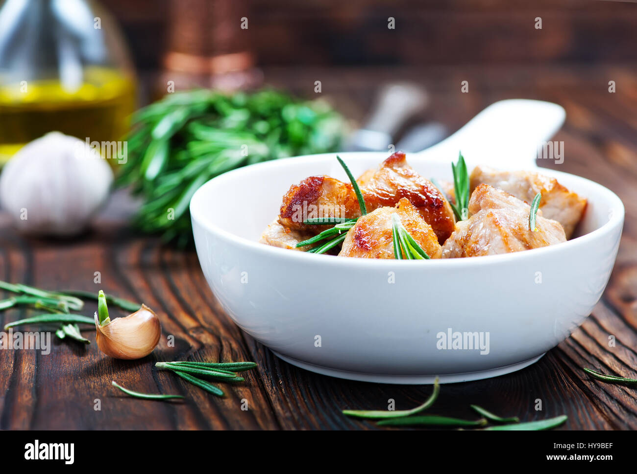 fried meat in bowl and on a table Stock Photo - Alamy