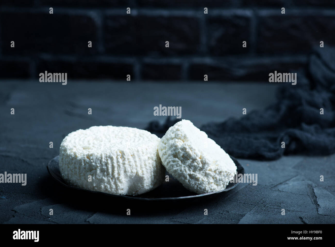 cottage cheese on plate and on a table Stock Photo - Alamy