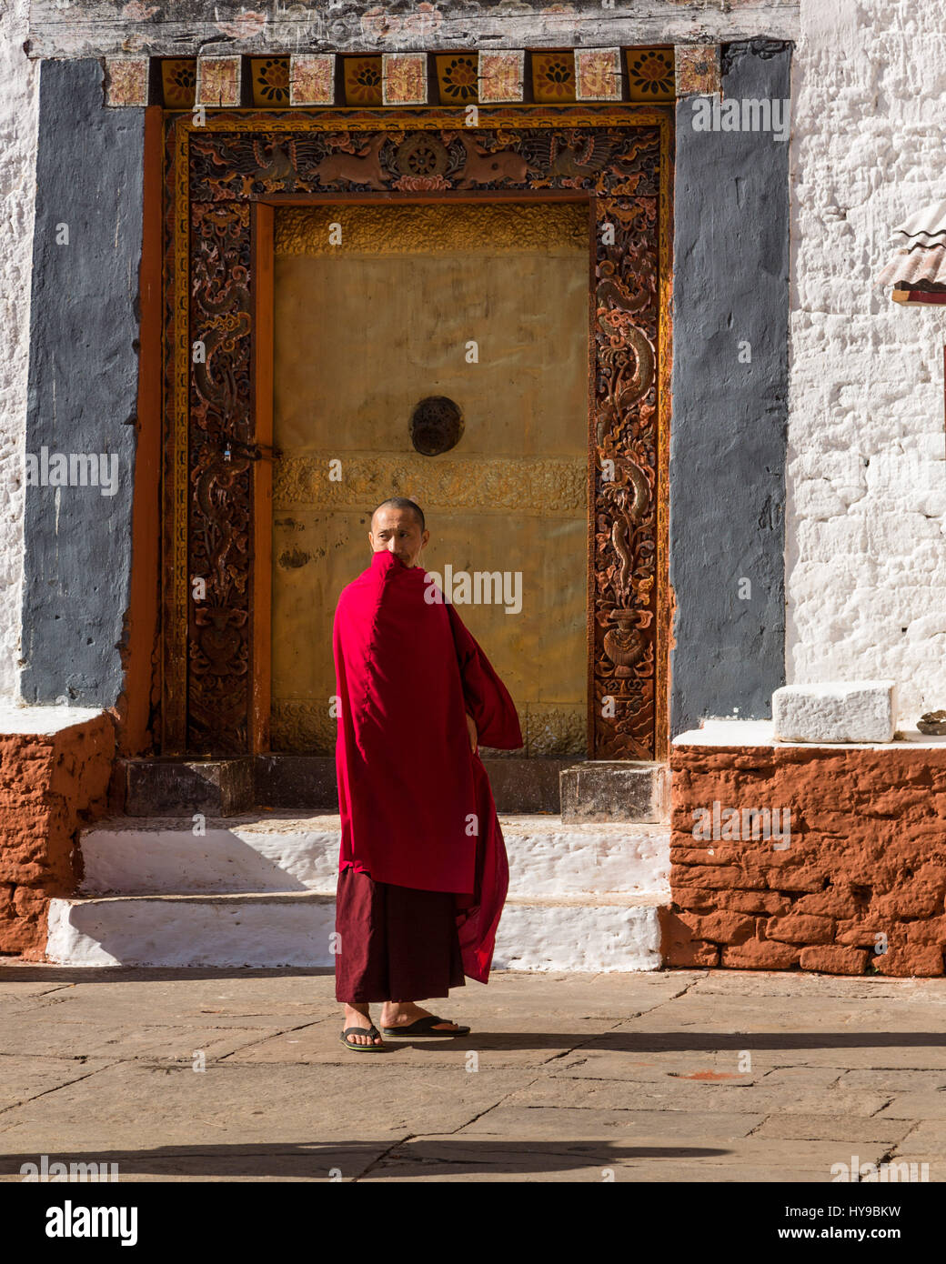 Buddhist monk in the religious courtyard of the Punakha Dzong, Punakha ...