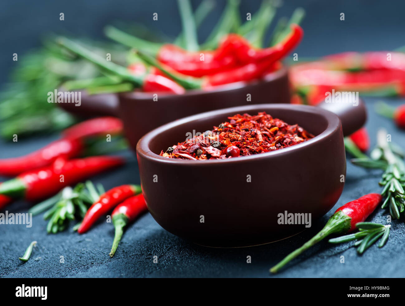 chilli peppers on the black table, chilli background Stock Photo - Alamy