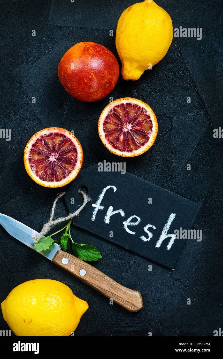 citrus background, fresh citrus fruit on a table Stock Photo - Alamy