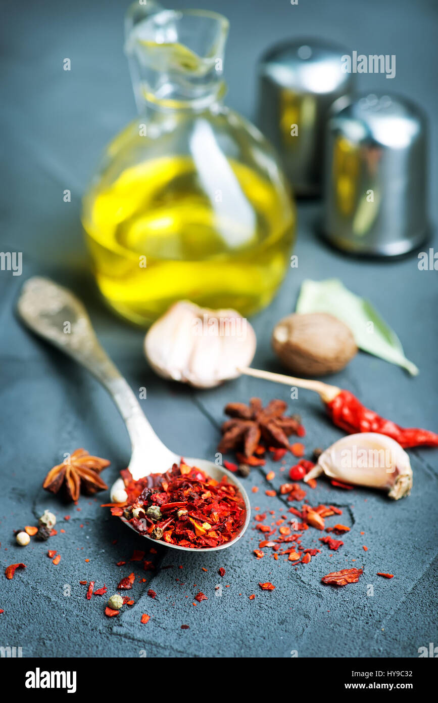 aroma spice in spoon and on a table Stock Photo - Alamy